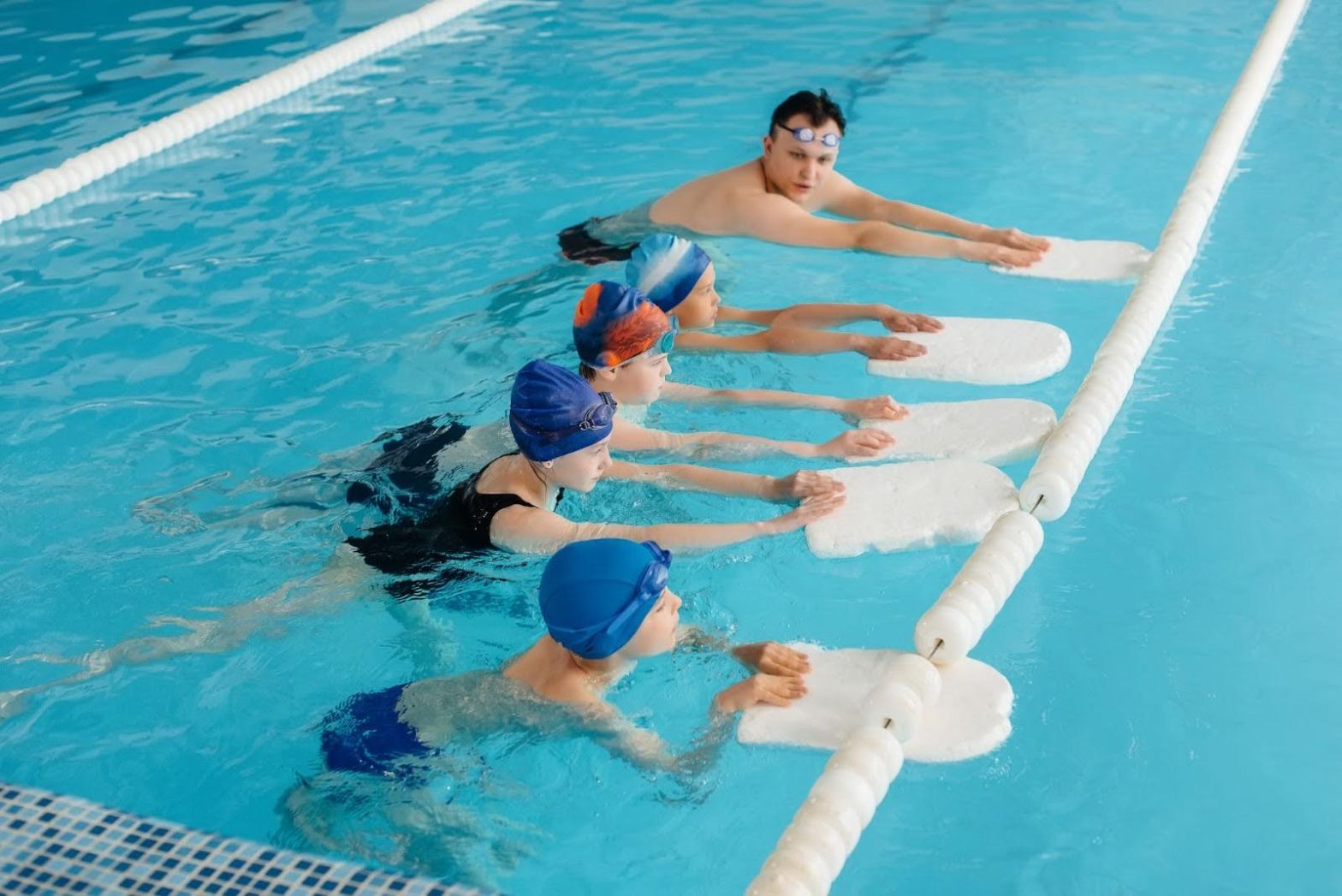 How To Teach Someone How To Swim: A Beginner's Guide - SwimHub